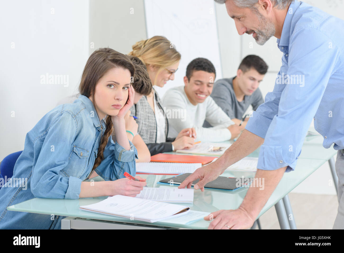 frustrated teenage girl at a school class Stock Photo - Alamy