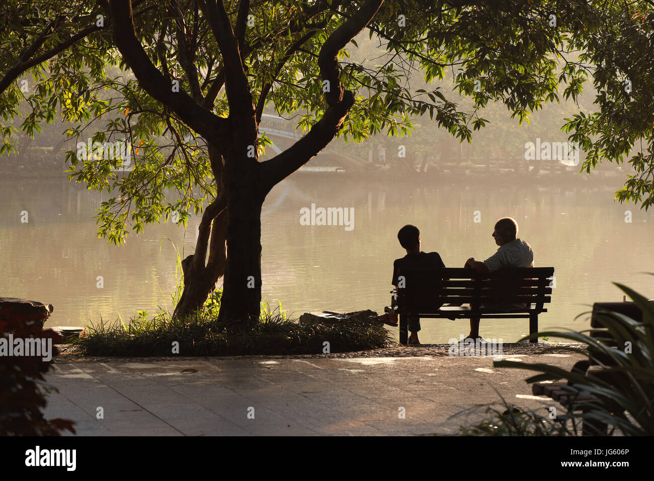 Two men talking Stock Photo - Alamy