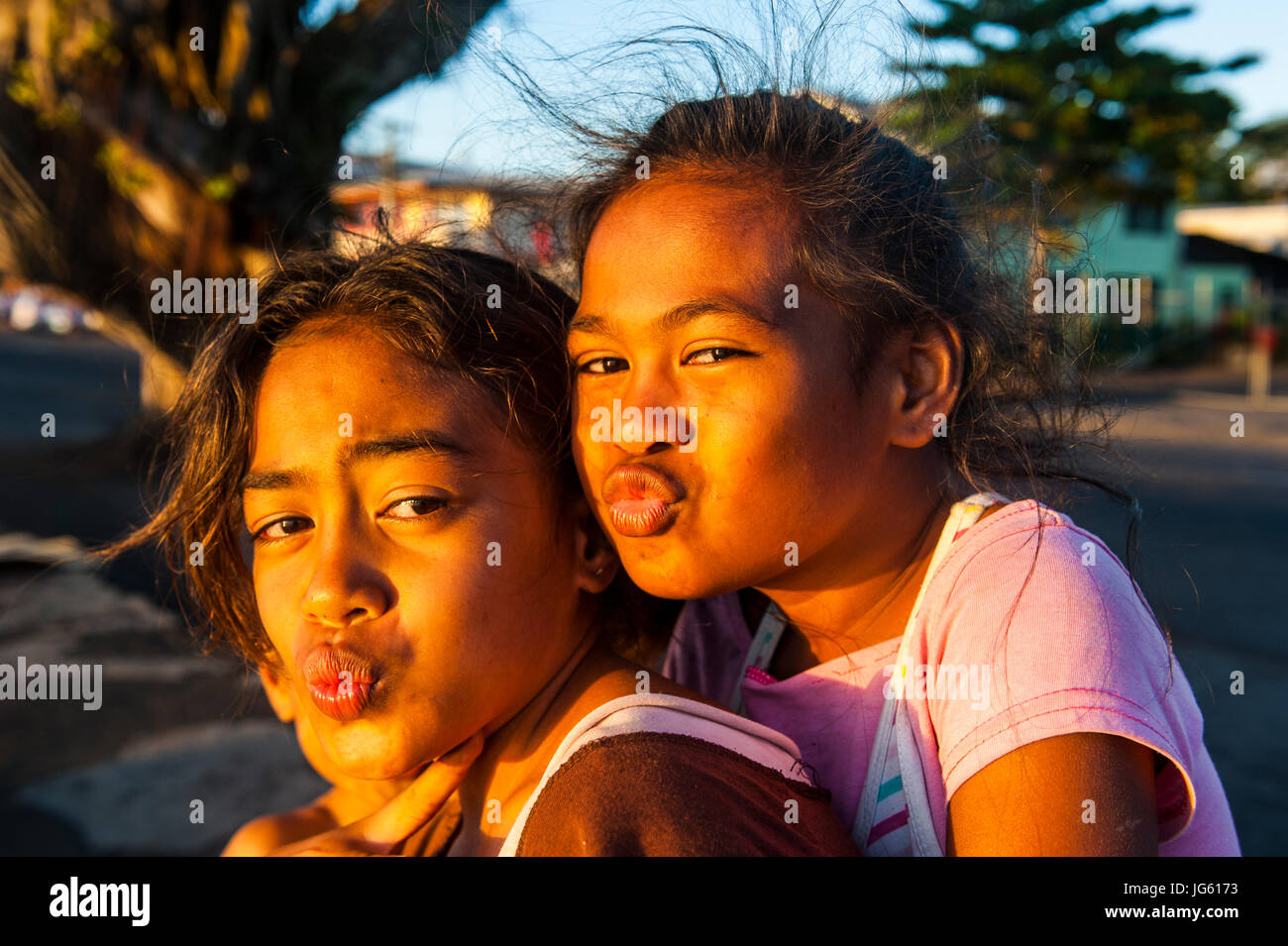 Young girls posing as western actors, Apia, Upolo, Samoa, South Pacific ...