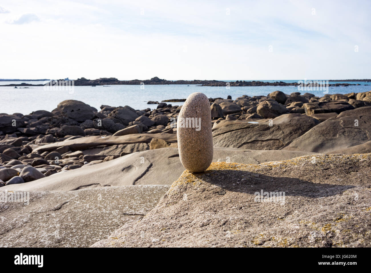 stone on seashore Stock Photo - Alamy