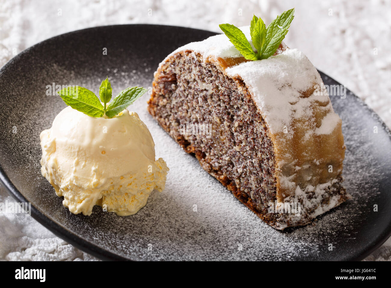 Beautiful food: poppy strudel with vanilla ice cream and mint on a ...