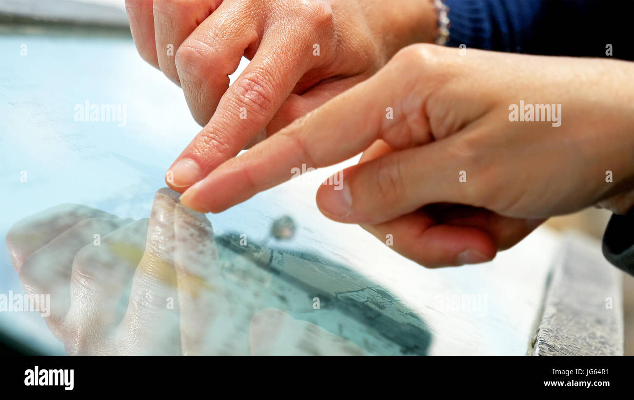 Finger pointing on map hi-res stock photography and images - Alamy