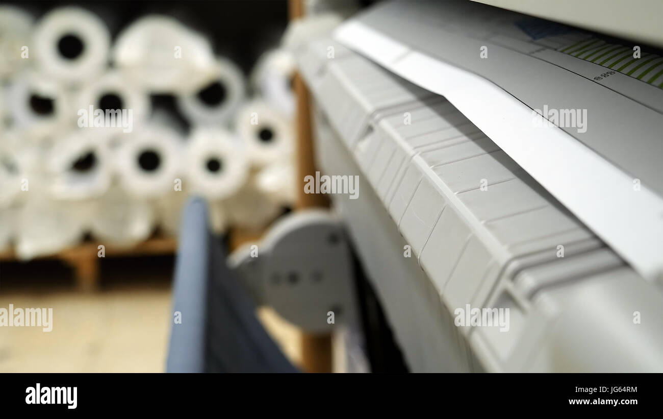 Wide format printer printing draft outline drawing Stock Photo - Alamy