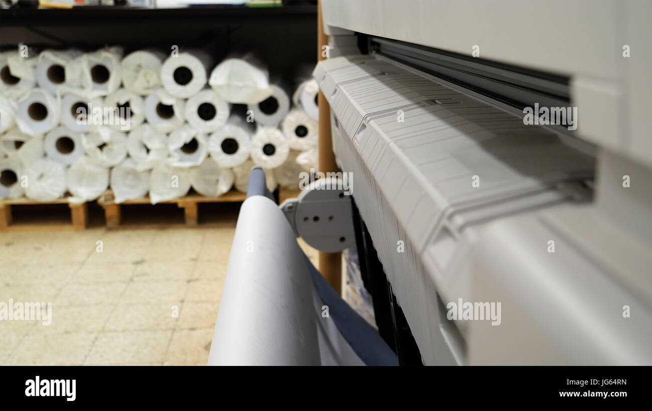 Wide format printer printing draft outline drawing Stock Photo - Alamy