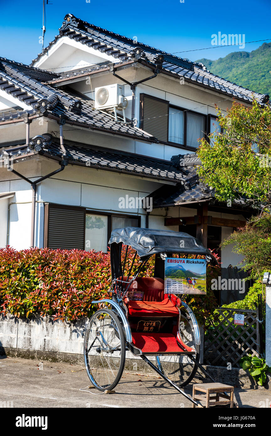 Rickshaw & house, Yufuin, Kyushu, Japan Stock Photo - Alamy
