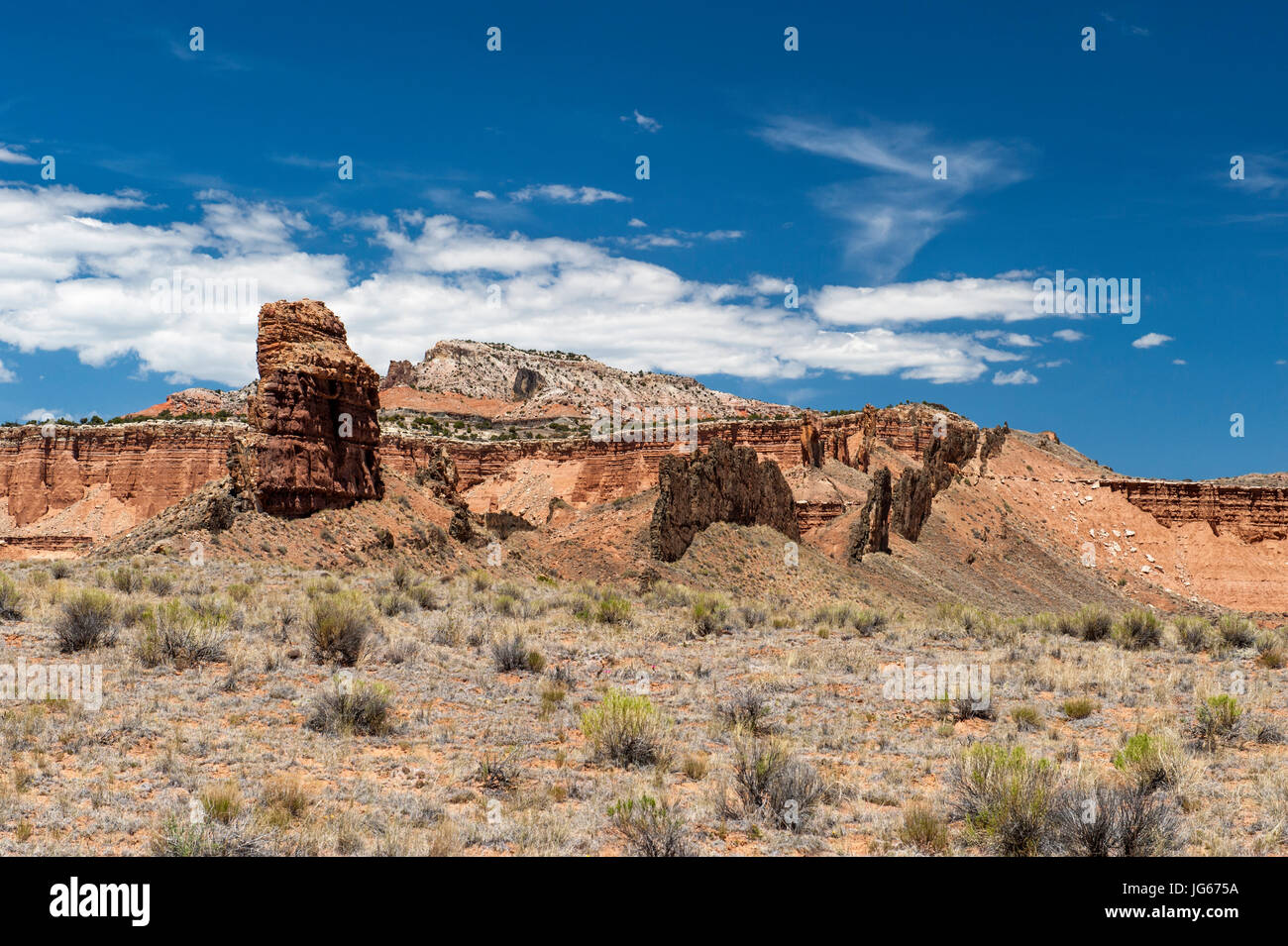 A dike of lava (black fins starting in the center of the photo and ...