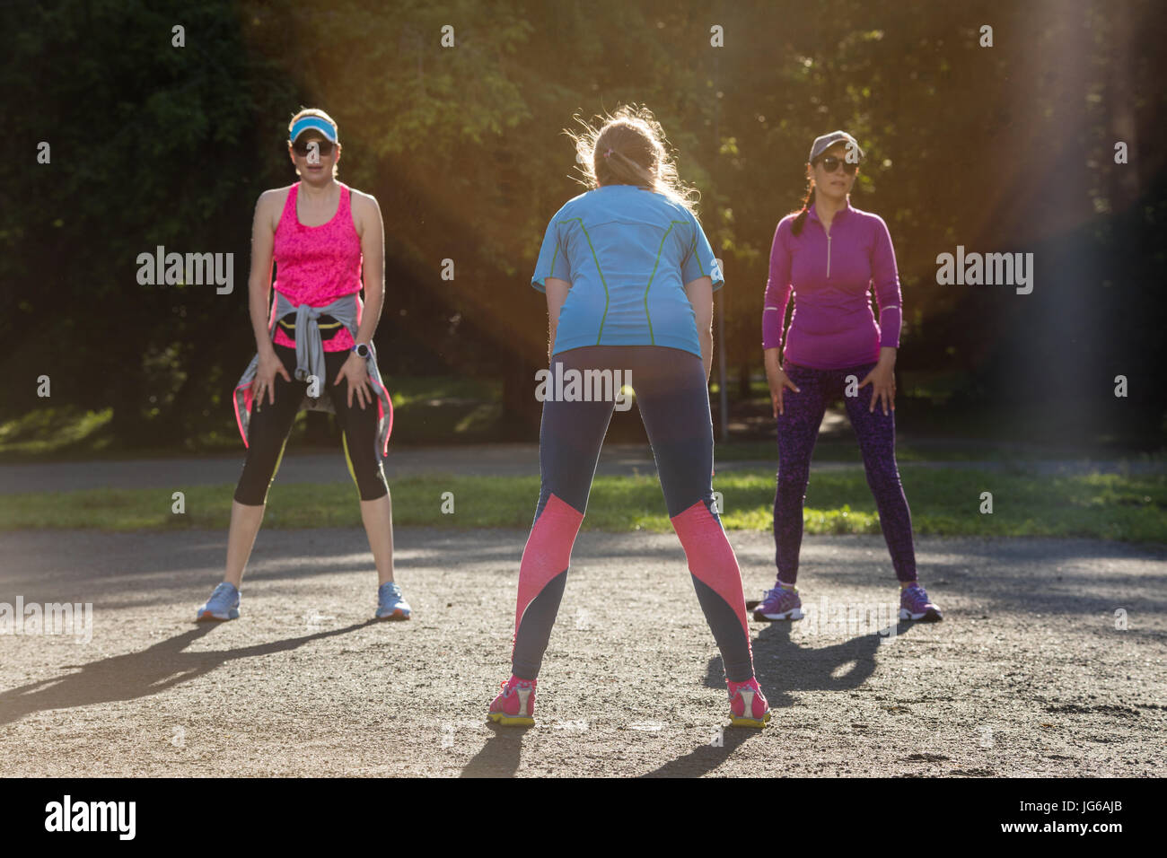 Women warming up outside Stock Photo - Alamy