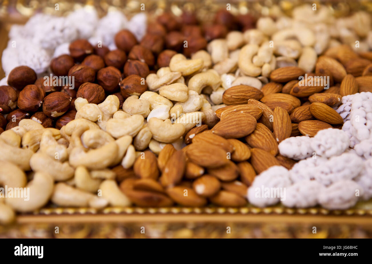 Natural background made from different kinds of nuts close up Stock ...