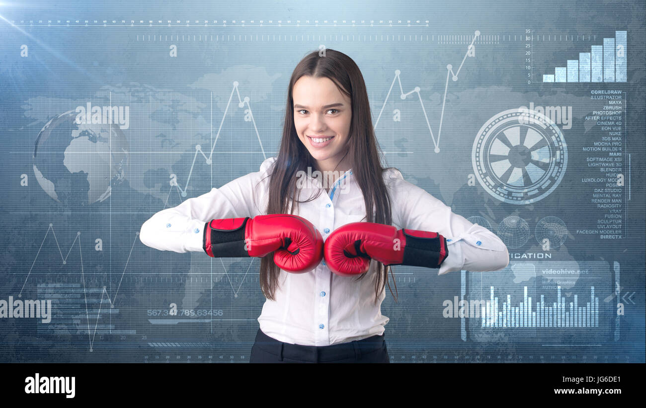 Young beautiful woman dress in suit standing in combat pose with red ...