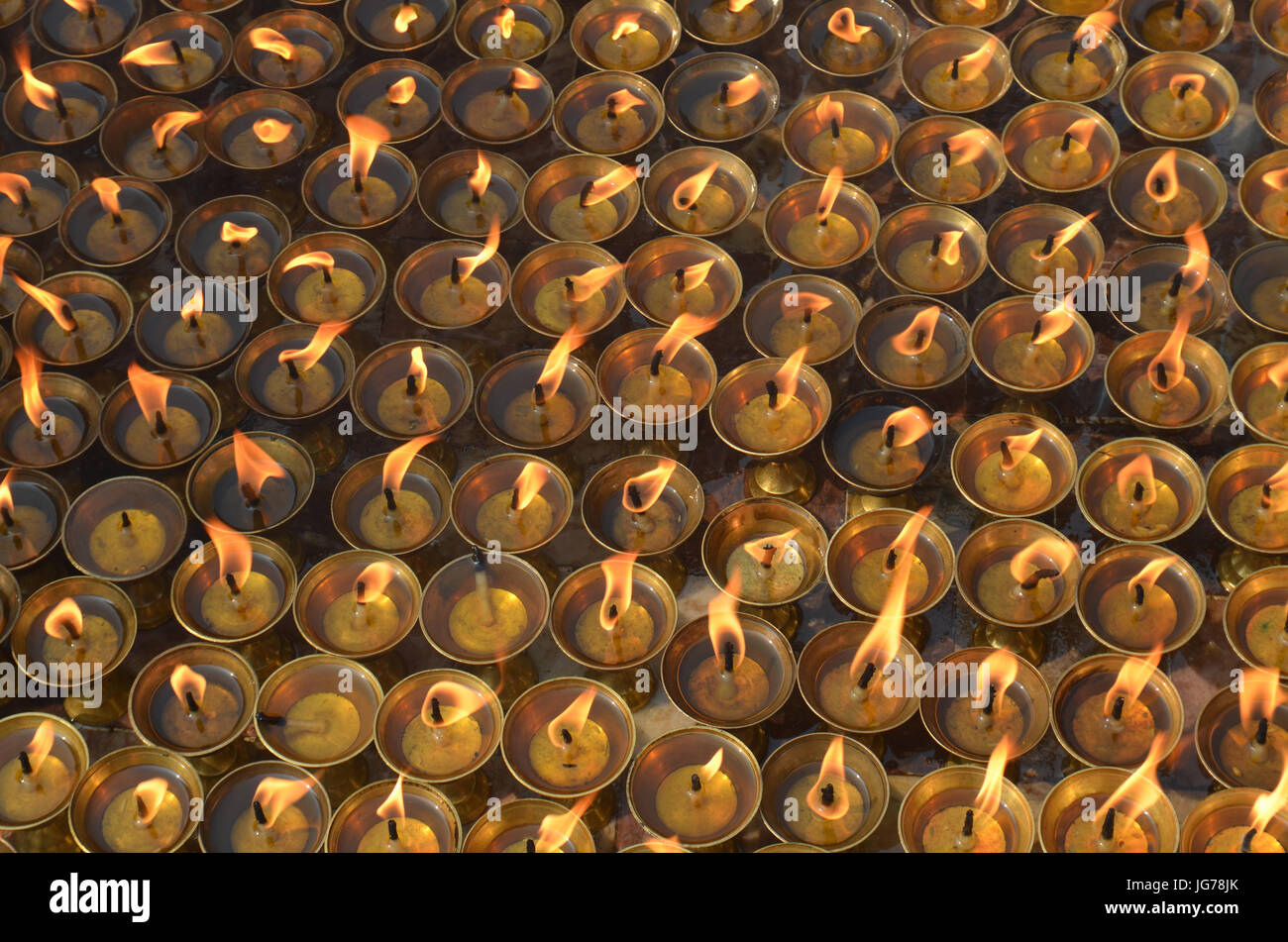 Buddhist oil lamps hi-res stock photography and images - Alamy