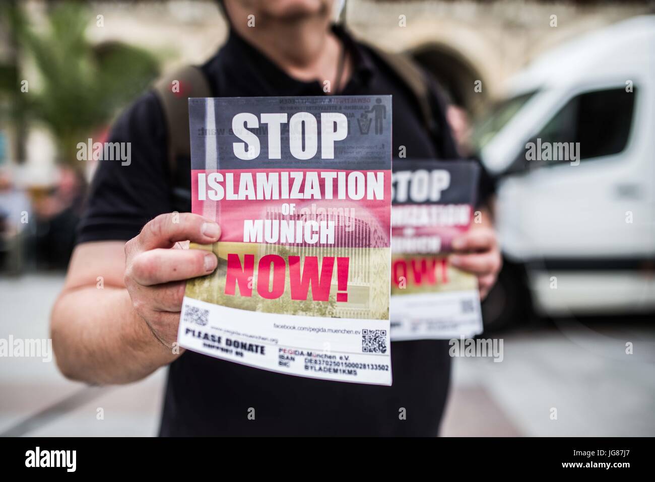 Munich, Bayern, Germany. 3rd July, 2017. Pegida follower offers a ...
