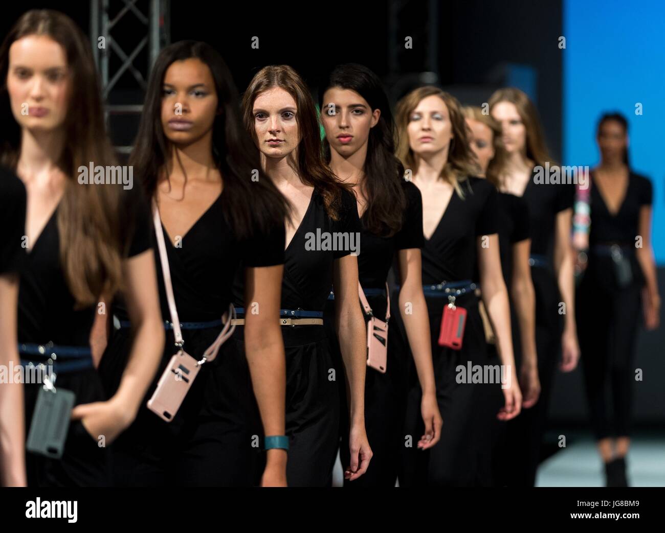 Berlin, Germany. 3rd July, 2017. Models wear clothes designed by Mike ...