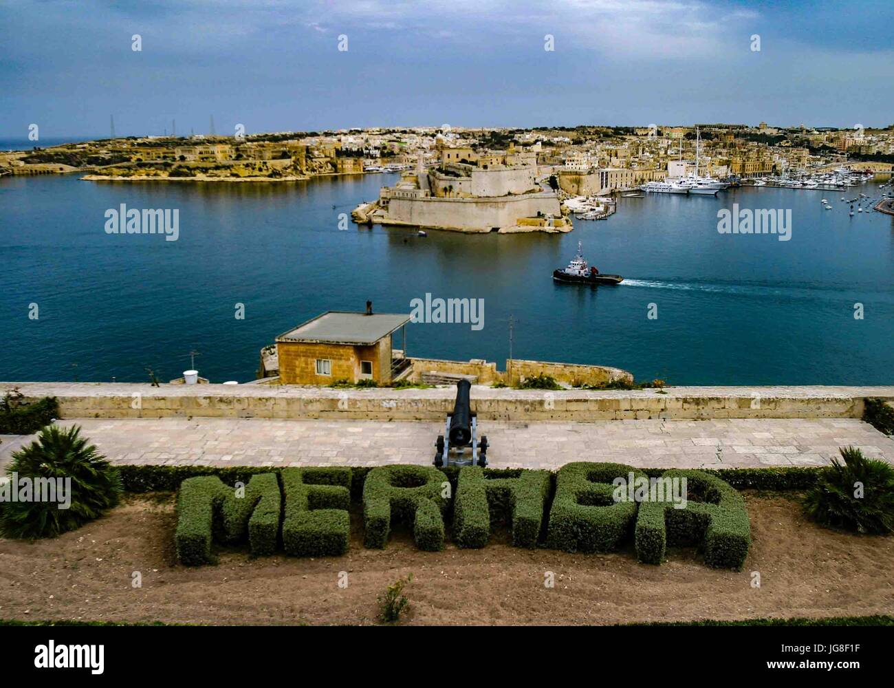Valletta, Malta. 11th Oct, 2004. As a tugboat sails by an antiquated ...