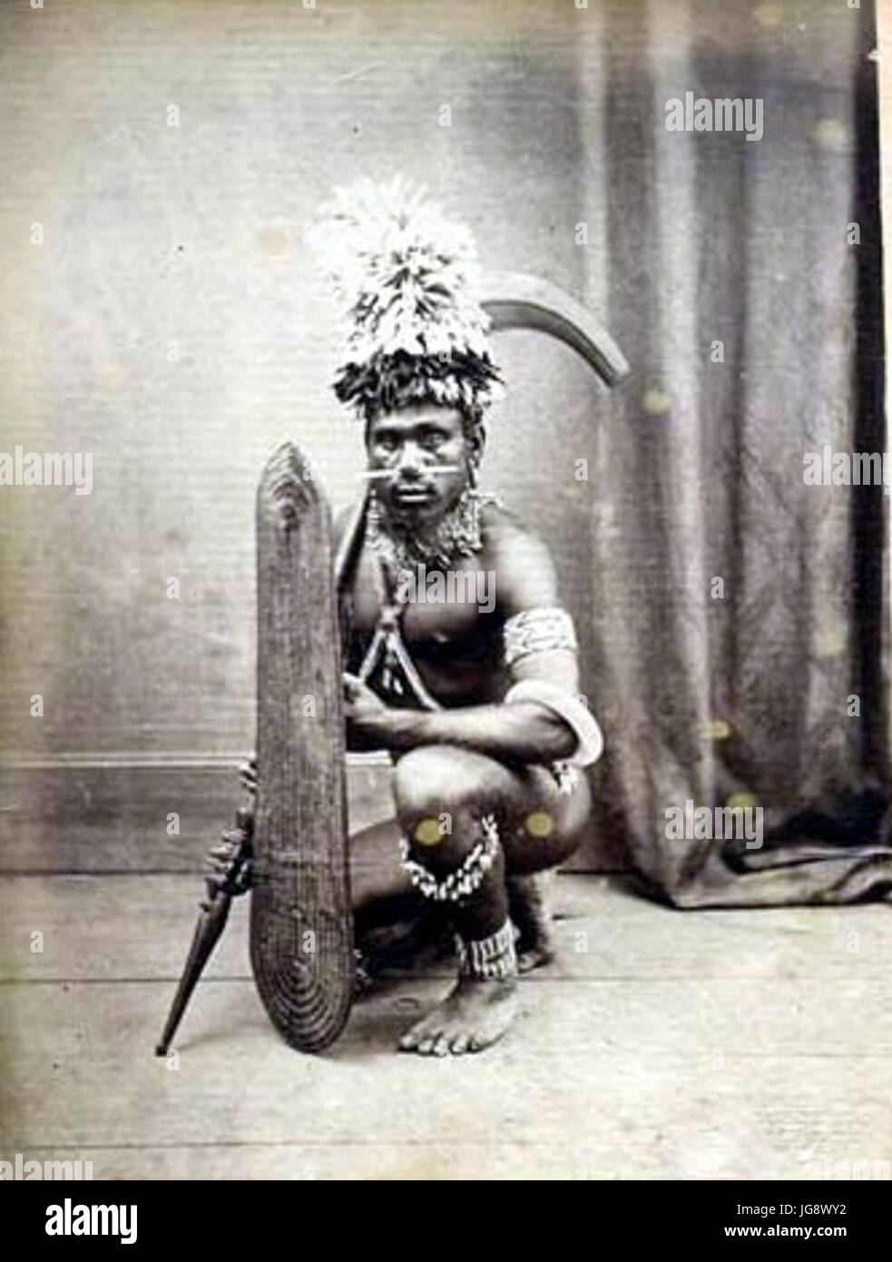 Warrior with wicker shield and parrying club Solomon Islands Stock ...