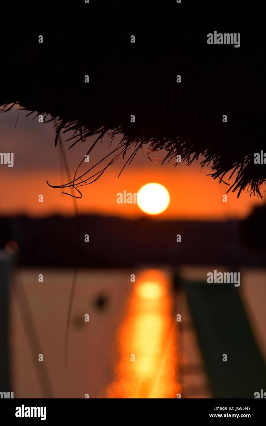 Sun Brolly Sunset Stock Photo - Alamy