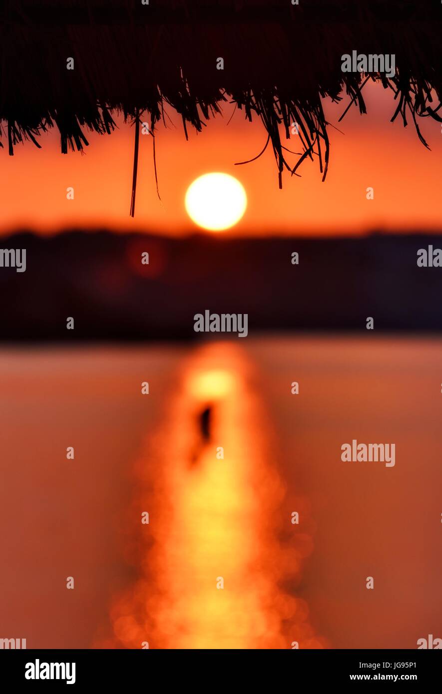 Sun Brolly Sunset Stock Photo - Alamy