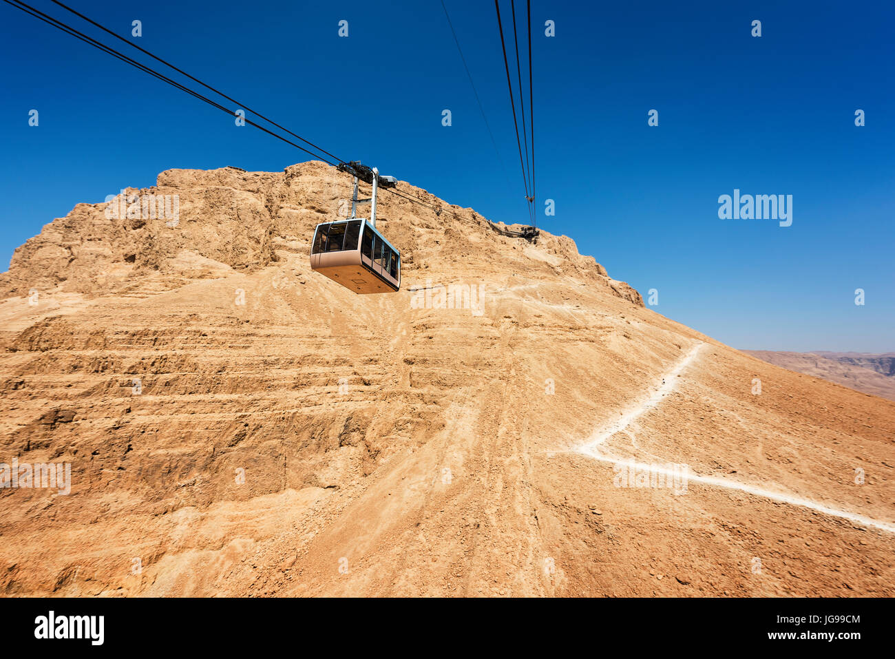 Cable car heading to the top of Masada National Park Stock Photo - Alamy