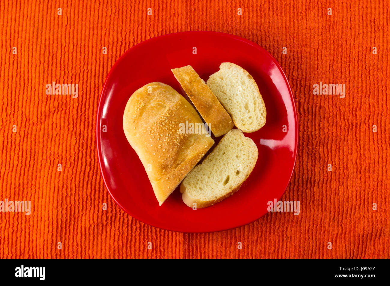 sliced whole wheat breads on a red plate Stock Photo - Alamy