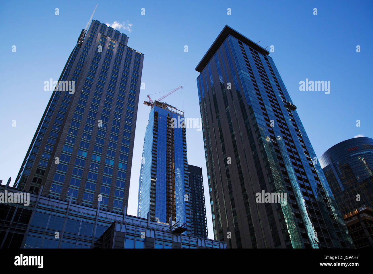 Construction on high-rise buildings in downtown Montreal, Canada. A ...