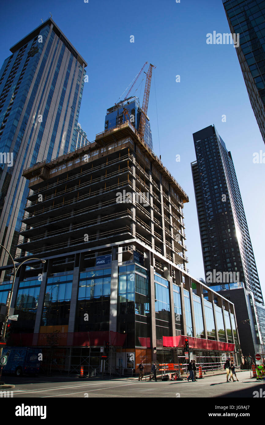 Construction on high-rise buildings in downtown Montreal, Canada. A ...
