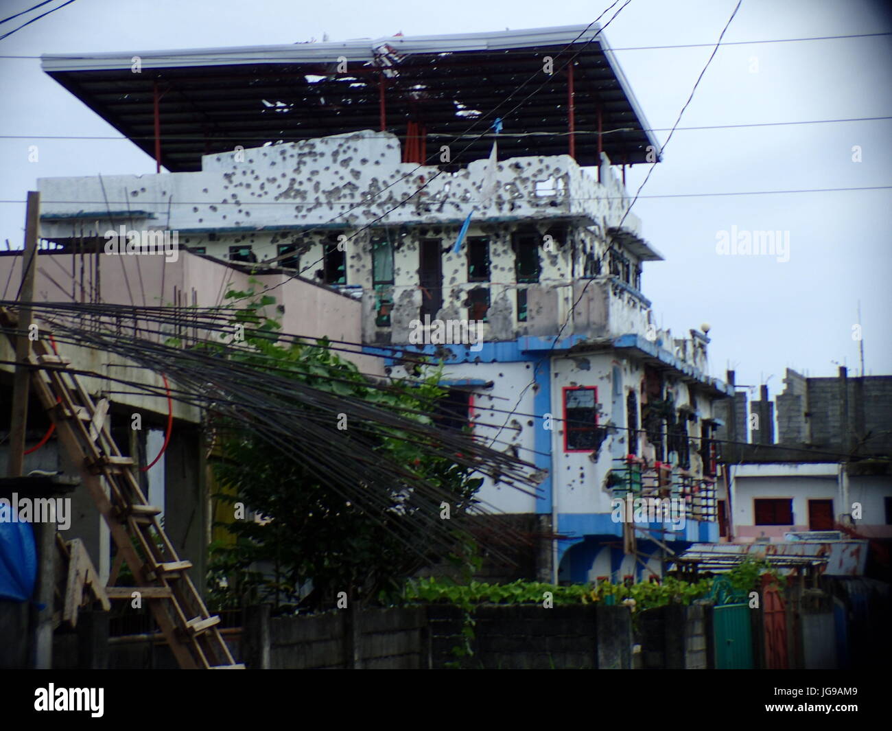 Marawi City, Philippines. 03rd July, 2017. Heavily damaged house in ...