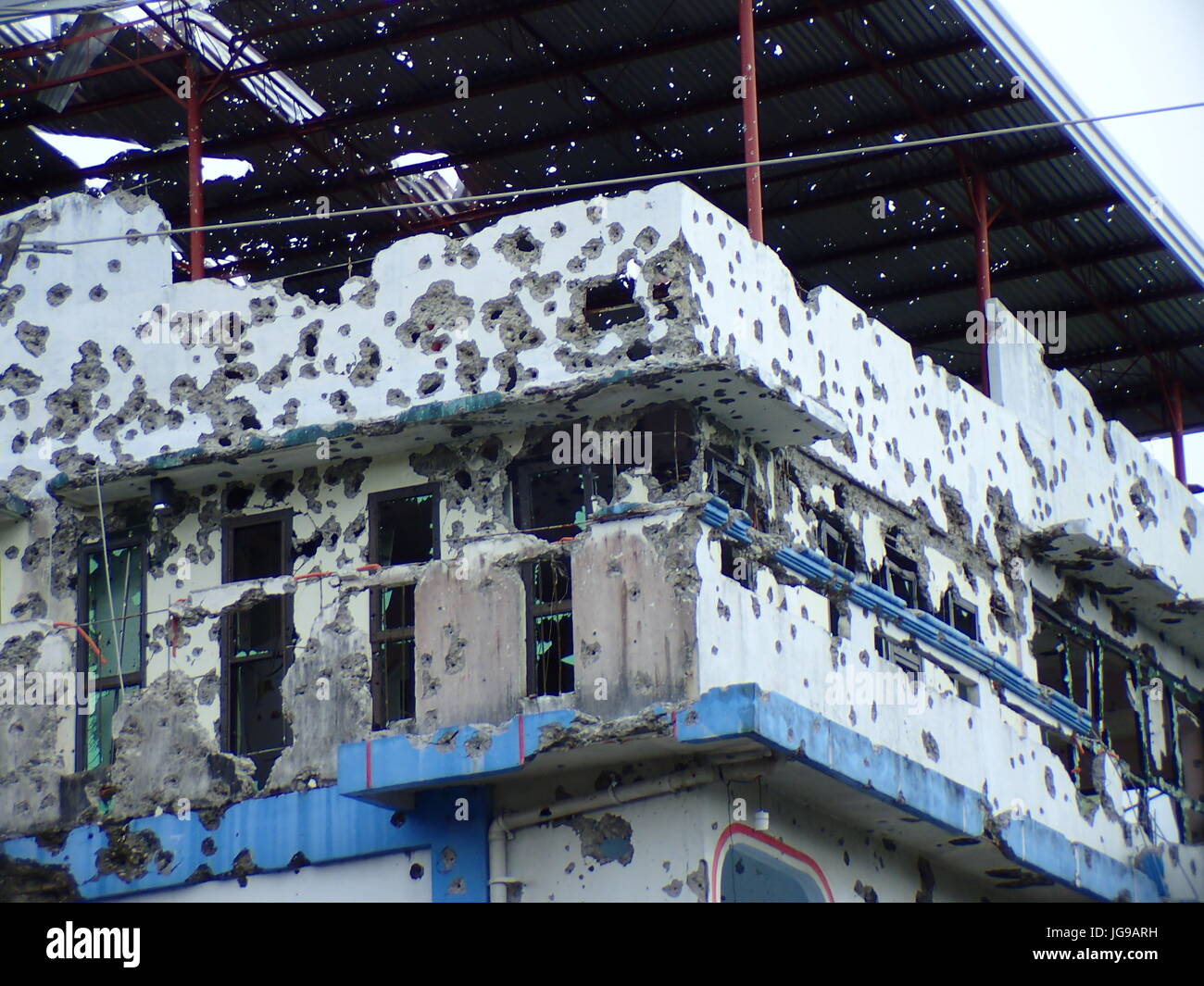 Marawi City, Philippines. 03rd July, 2017. Heavily damaged house in ...