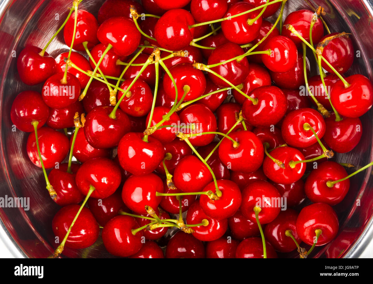large ripe red cherries in a dish of stainless steel, close-up Stock ...