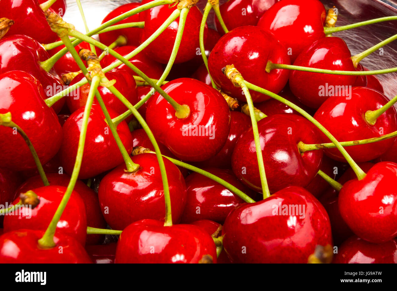 large ripe red cherries in a dish of stainless steel, close-up Stock ...
