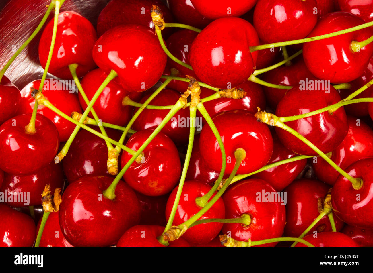 large ripe red cherries in a dish of stainless steel, close-up Stock ...