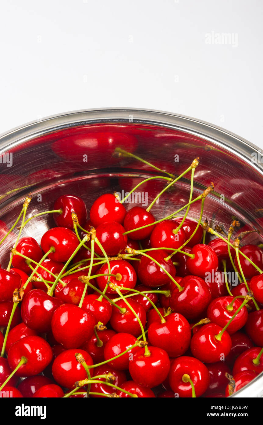 large ripe red cherries in a dish of stainless steel, close-up Stock ...