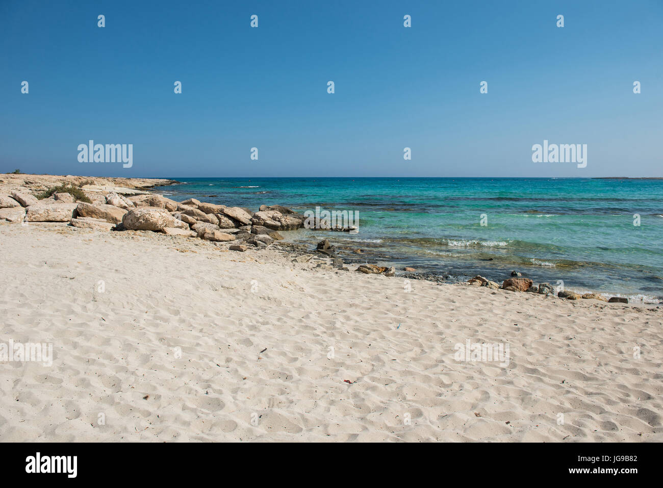 Sandy beach in Cyprus. Turquoise water of Mediterranean sea Stock Photo ...