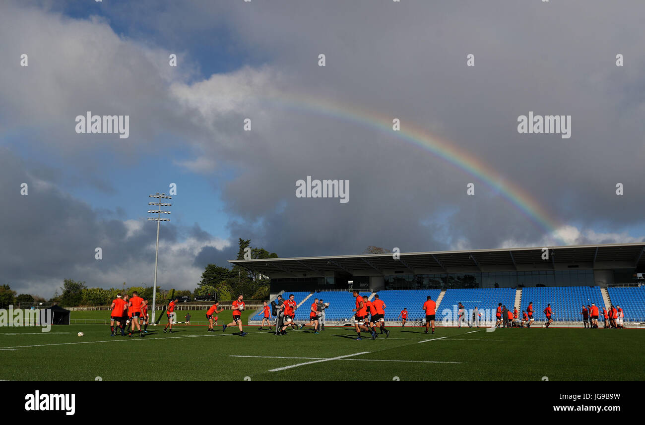 A rainbow forms over The All Blacks during their training session at ...