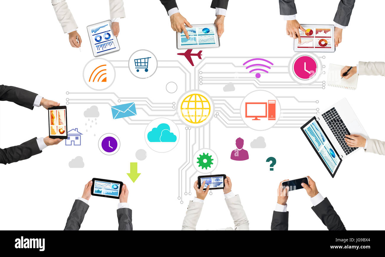 Group of people with devices in hands working together as symbol of ...