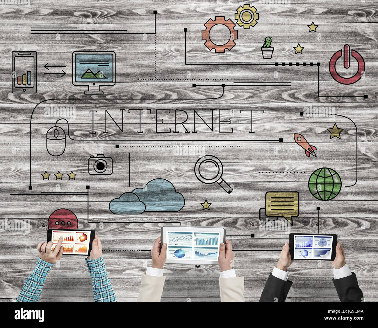 Group of three people with devices in hands working together as symbol ...
