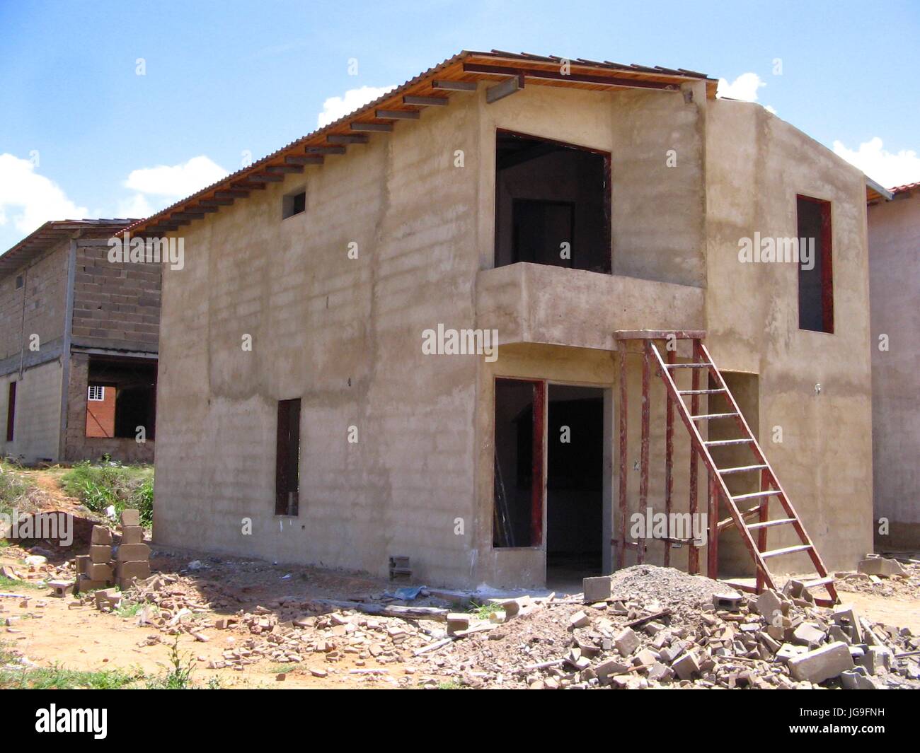 Gray Brick house under construction Stock Photo - Alamy