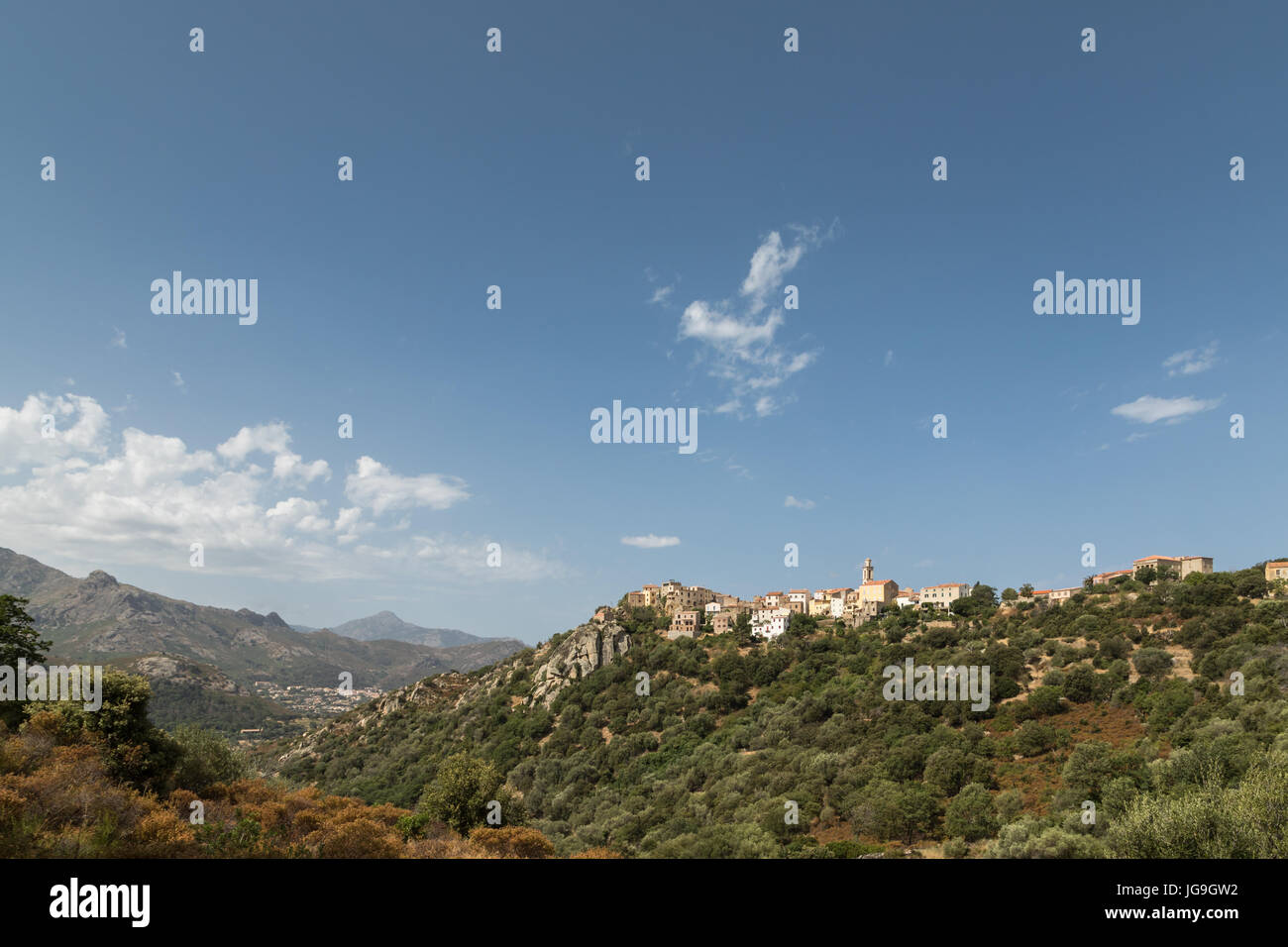 Houses and church tower in the mountain village of Montemaggiore in the ...