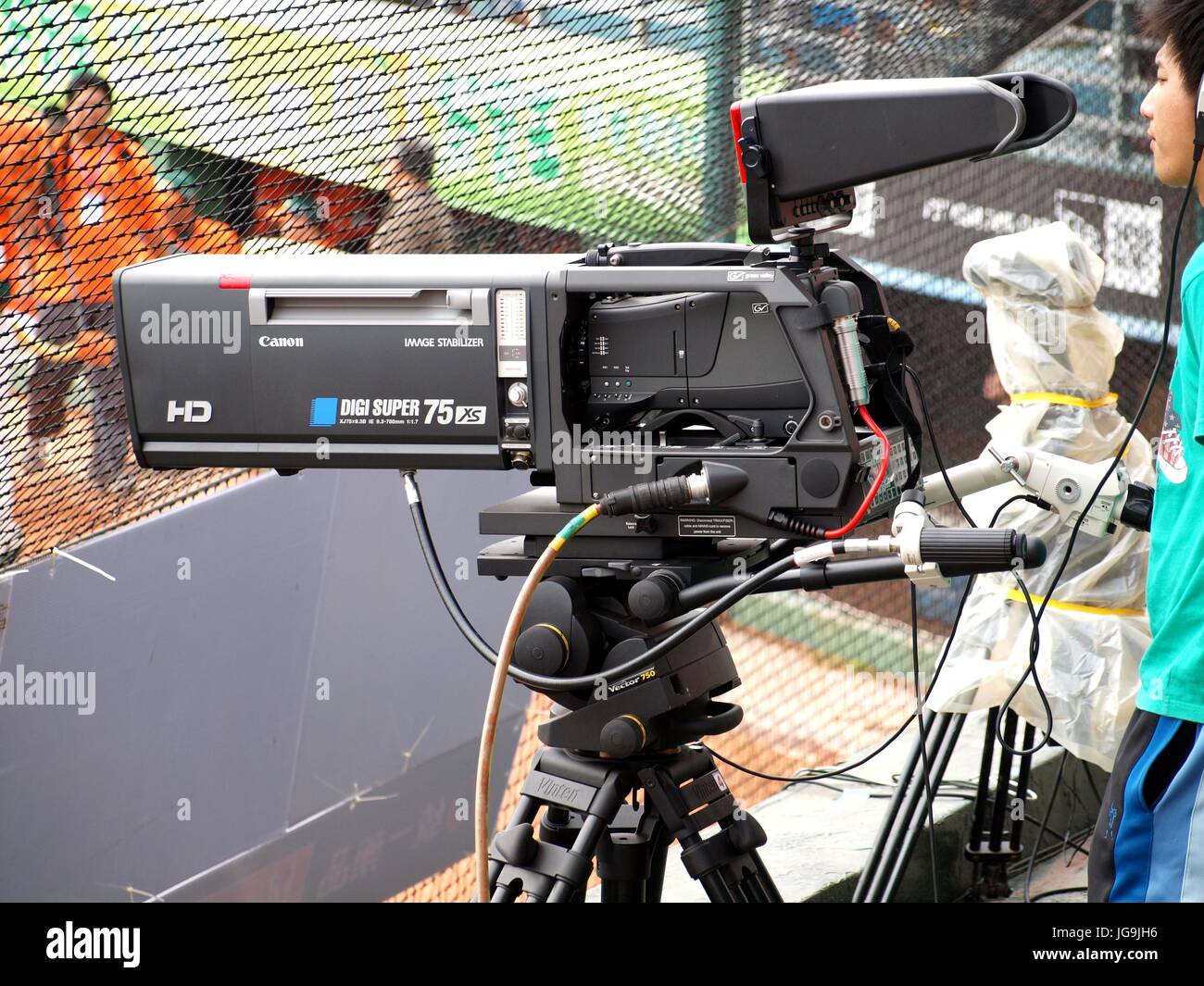 A high definition camera records a sporting event for television Stock ...