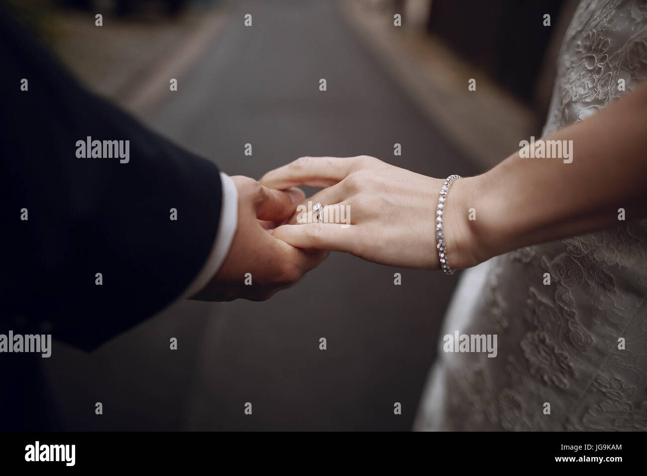 happy bride holding hands Stock Photo - Alamy