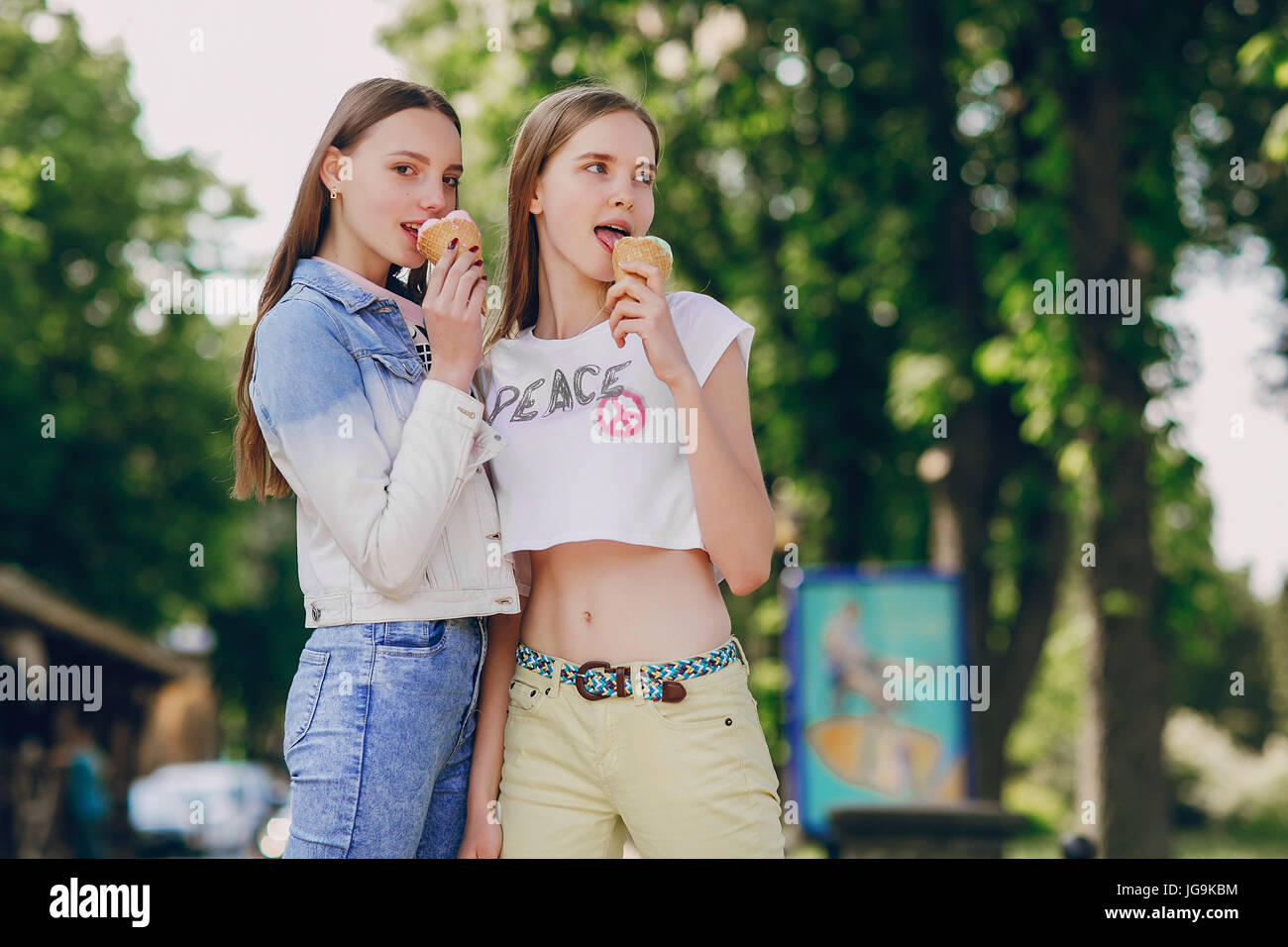 beautiful models pose for a photo in trendy clothes Stock Photo - Alamy
