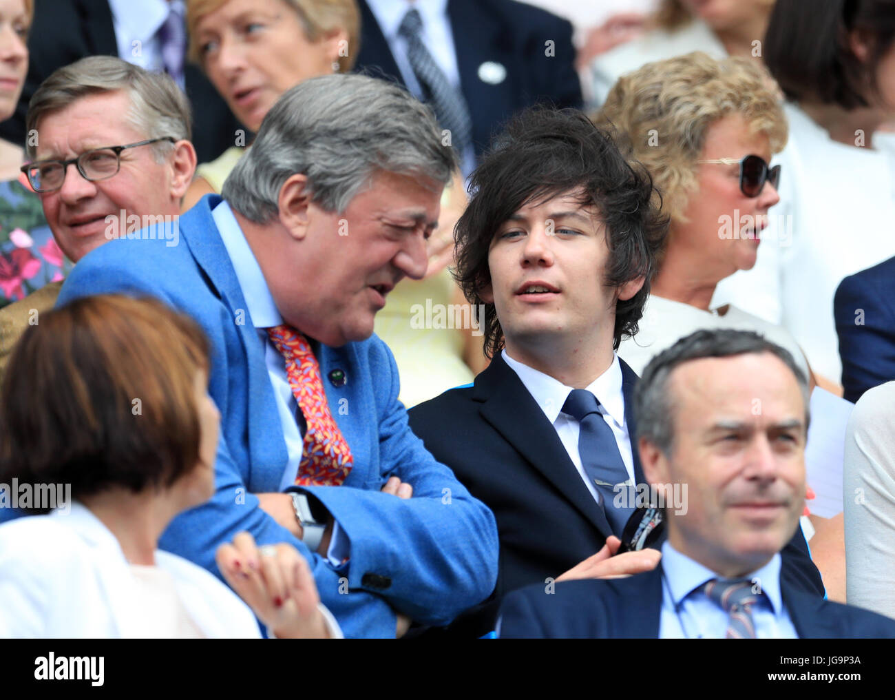 Stephen Fry and Elliott Spencer (right) in the Royal Box on day two of ...