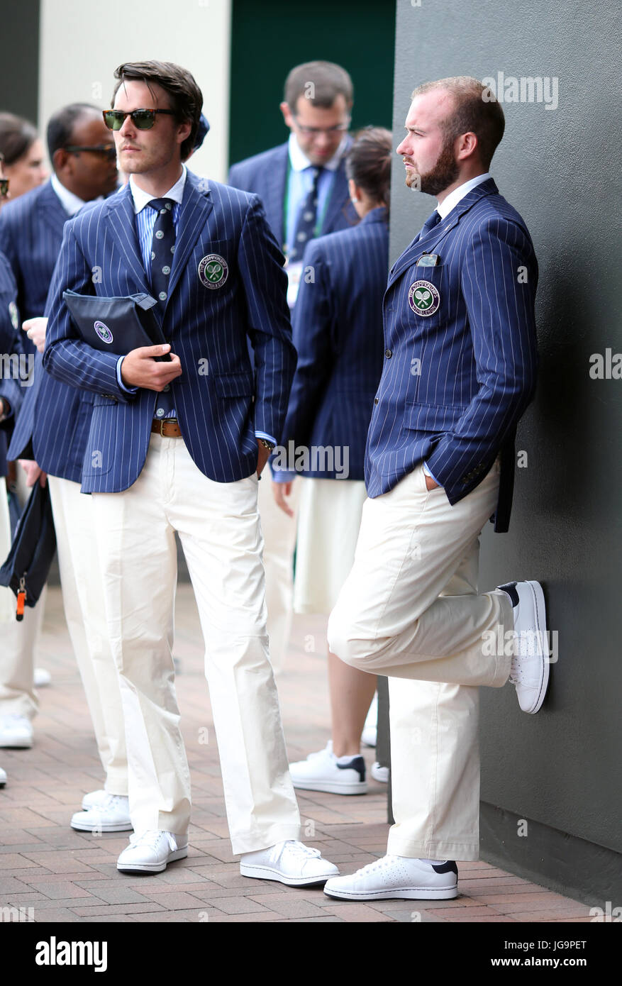 Line officials wait to go on court three on day two of the Wimbledon ...