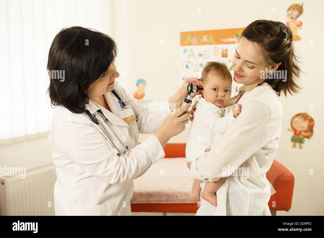 Child's otolaryngologist doing ear examination of baby Stock Photo - Alamy