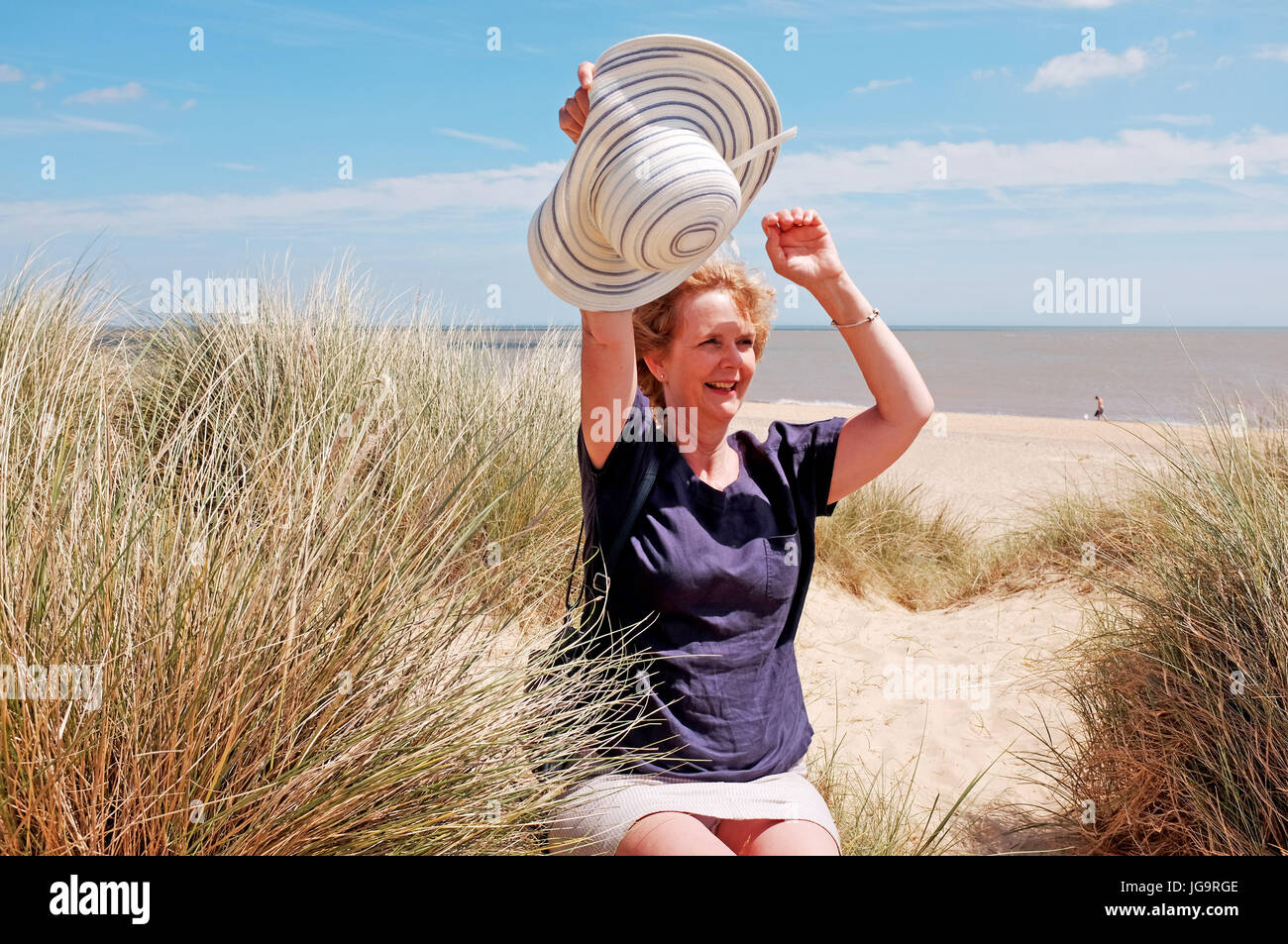 Mature woman beach sun hi-res stock photography and images - Alamy