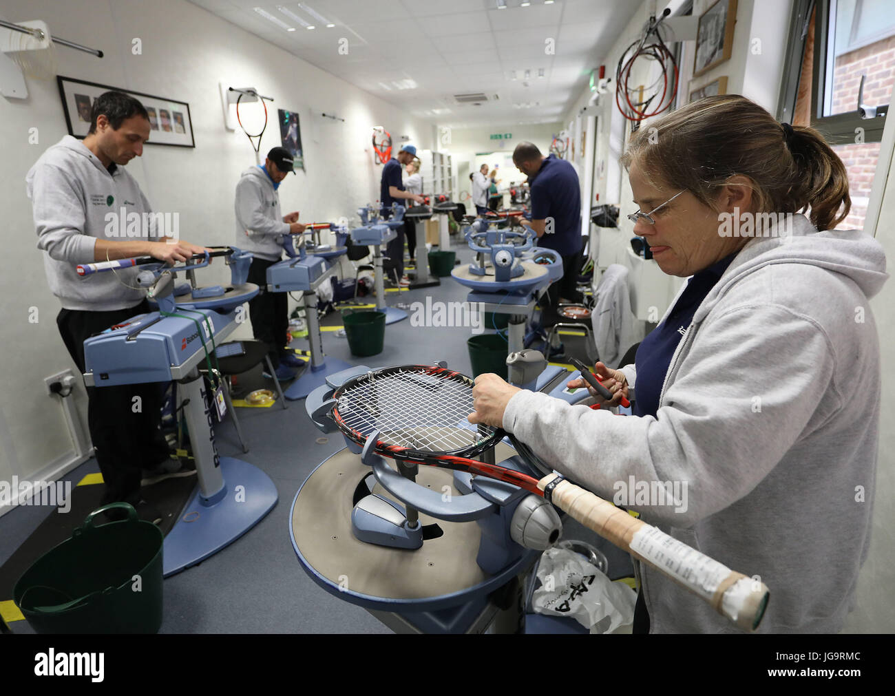 Rackets being strung in the Stringing Room on day two of the Wimbledon ...
