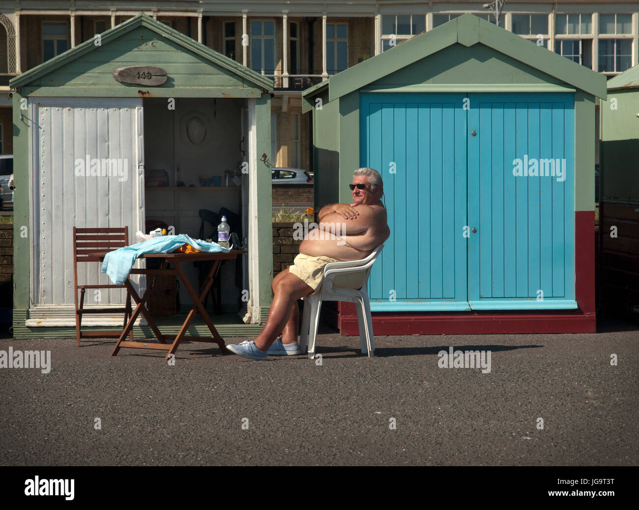 Fat man sunbathing hi-res stock photography and images - Alamy