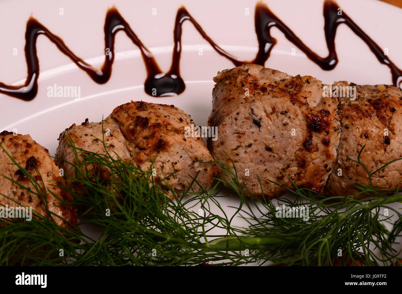Barbecue on a plate Stock Photo - Alamy