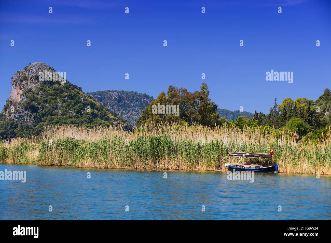 TURKEY, MUGLA ,DALYAN, - 5 MAY , 2017: The Dalyan River with tourist ...