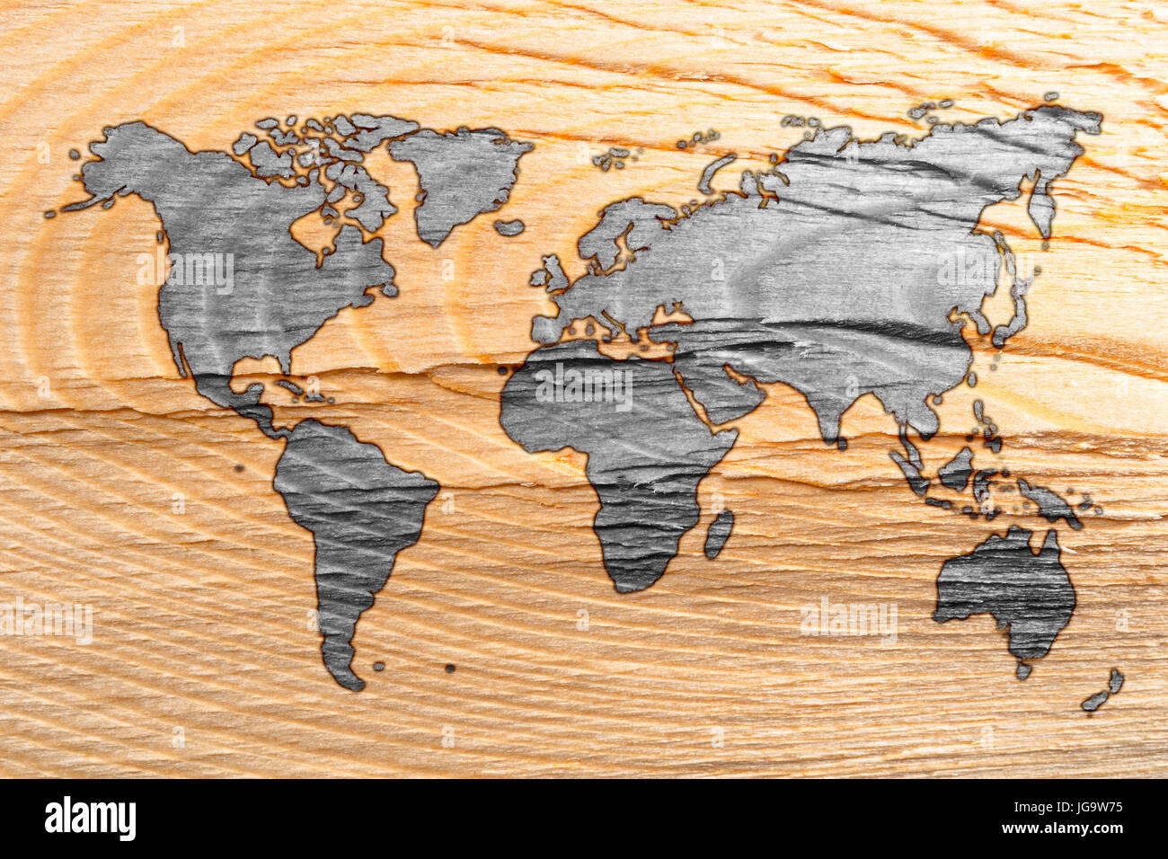 Unusual Earth map on textured wood background Stock Photo - Alamy