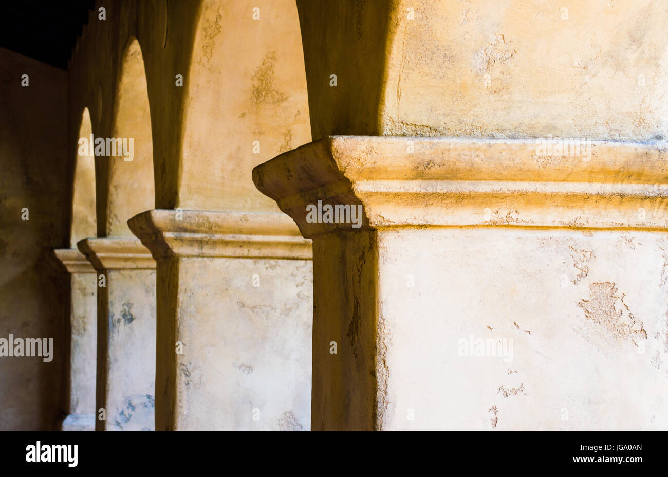 row of tan adobe columns in San Diego, California Stock Photo - Alamy