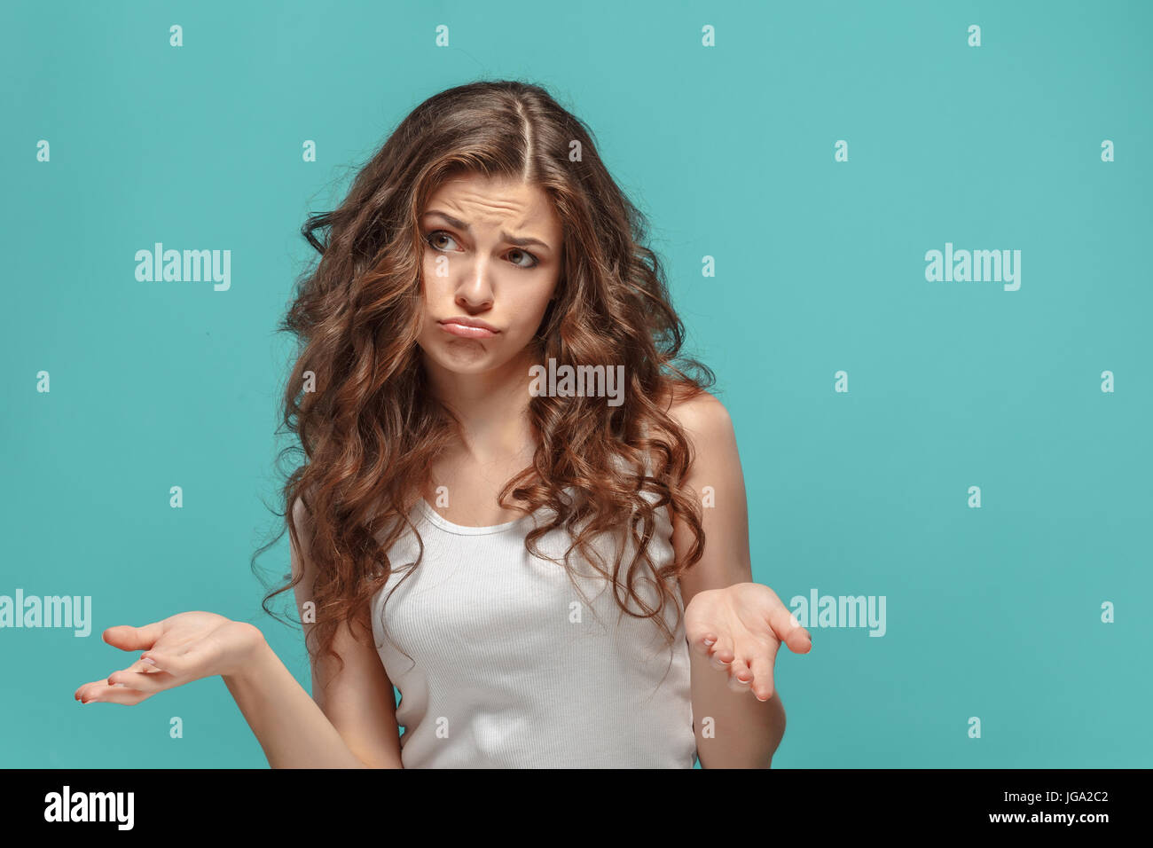 The young woman's portrait with sad emotions Stock Photo - Alamy